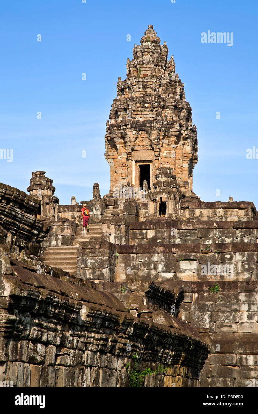 Tourist visiting the Bakong temple. Roluos group. Angkor. Cambodia ...