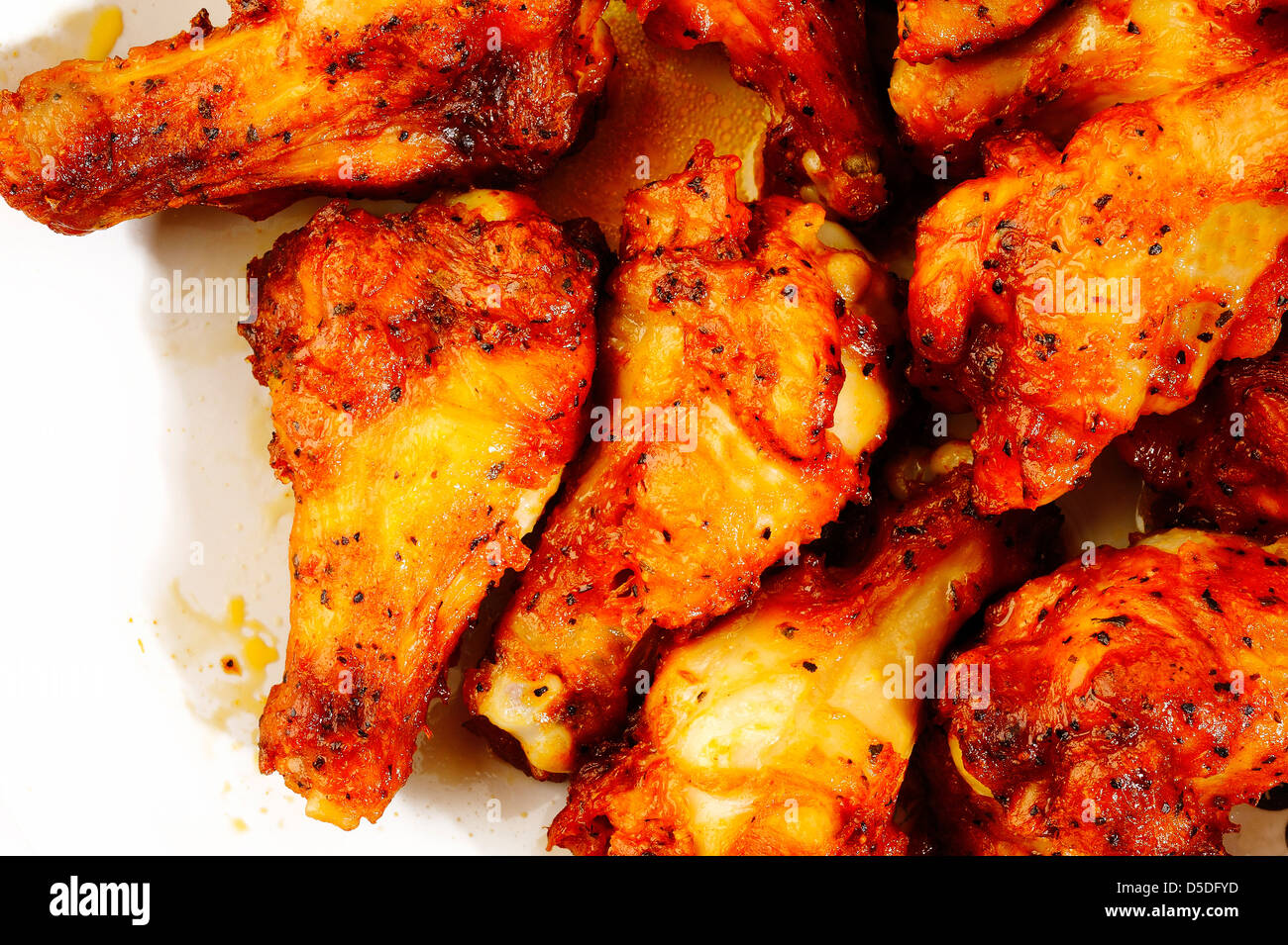 chicken wings stick on white background Stock Photo - Alamy