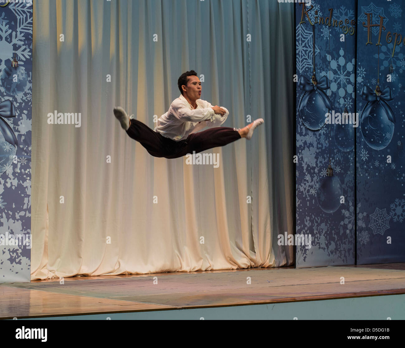 Adult ballet dancer performing on stage in a shopping center on Cagayan ...