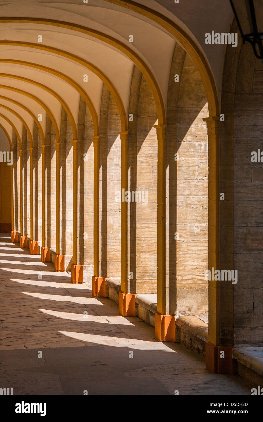 A corridor in a medieval cloister with sunlight Stock Photo - Alamy