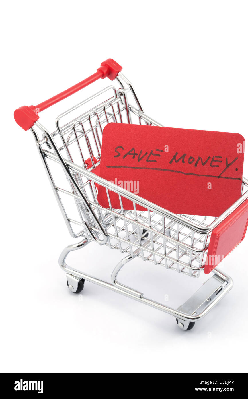 Save money words written on red paper card in shopping cart on white ...