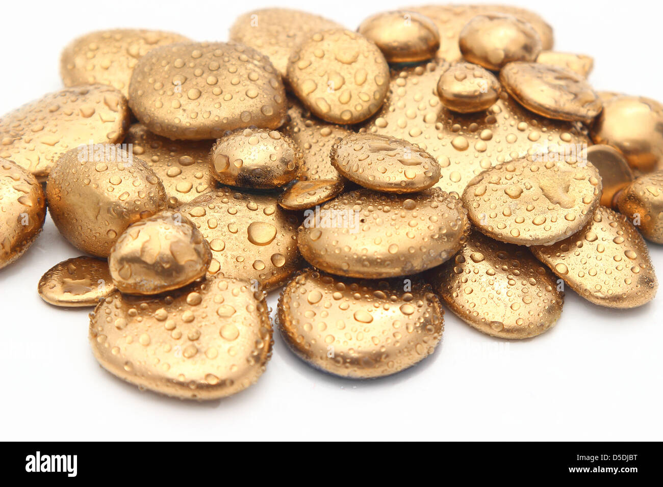 Gold pebbles hi-res stock photography and images - Alamy