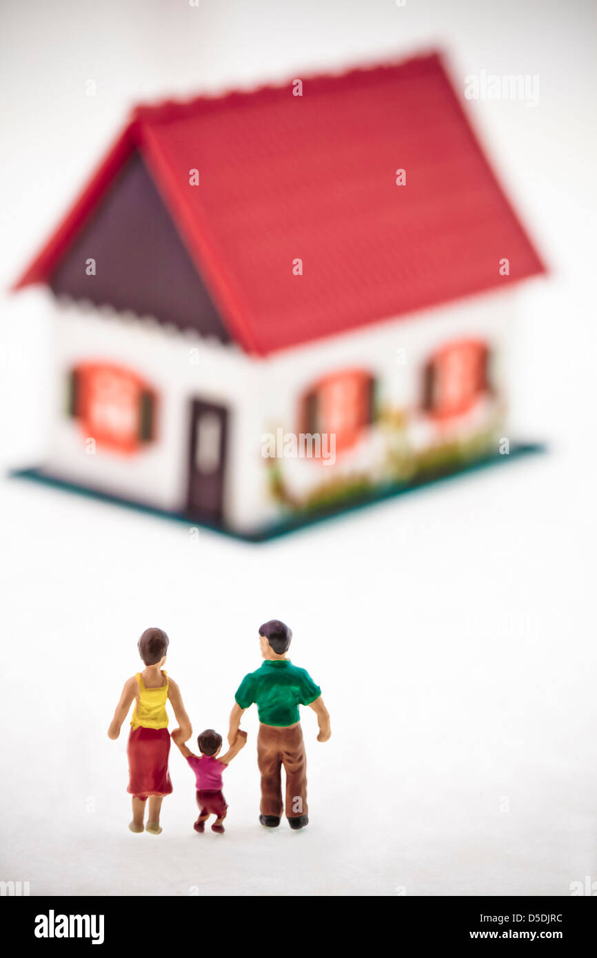 House with family hi-res stock photography and images - Alamy