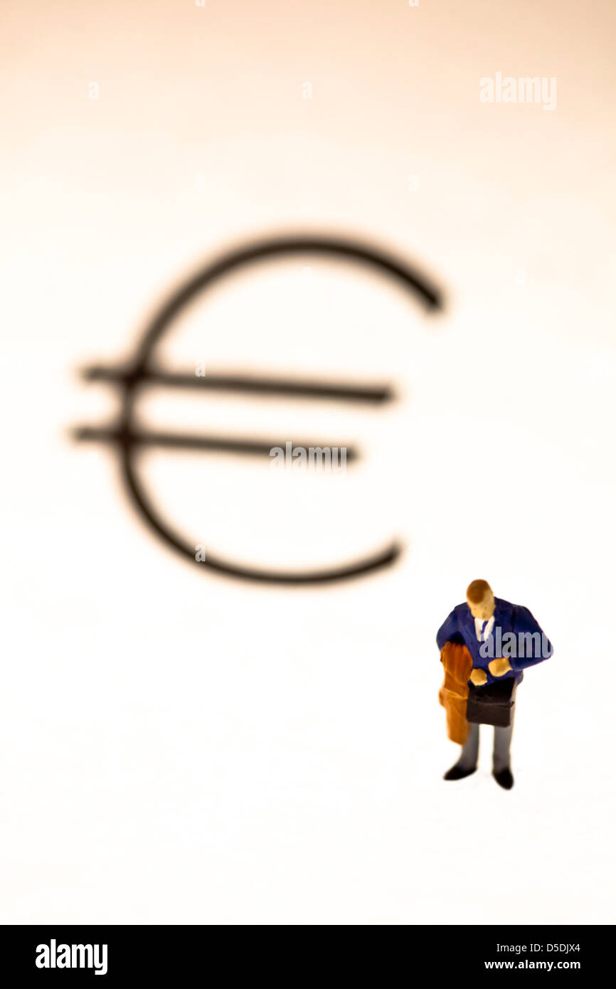 businessman and euro sign Stock Photo - Alamy