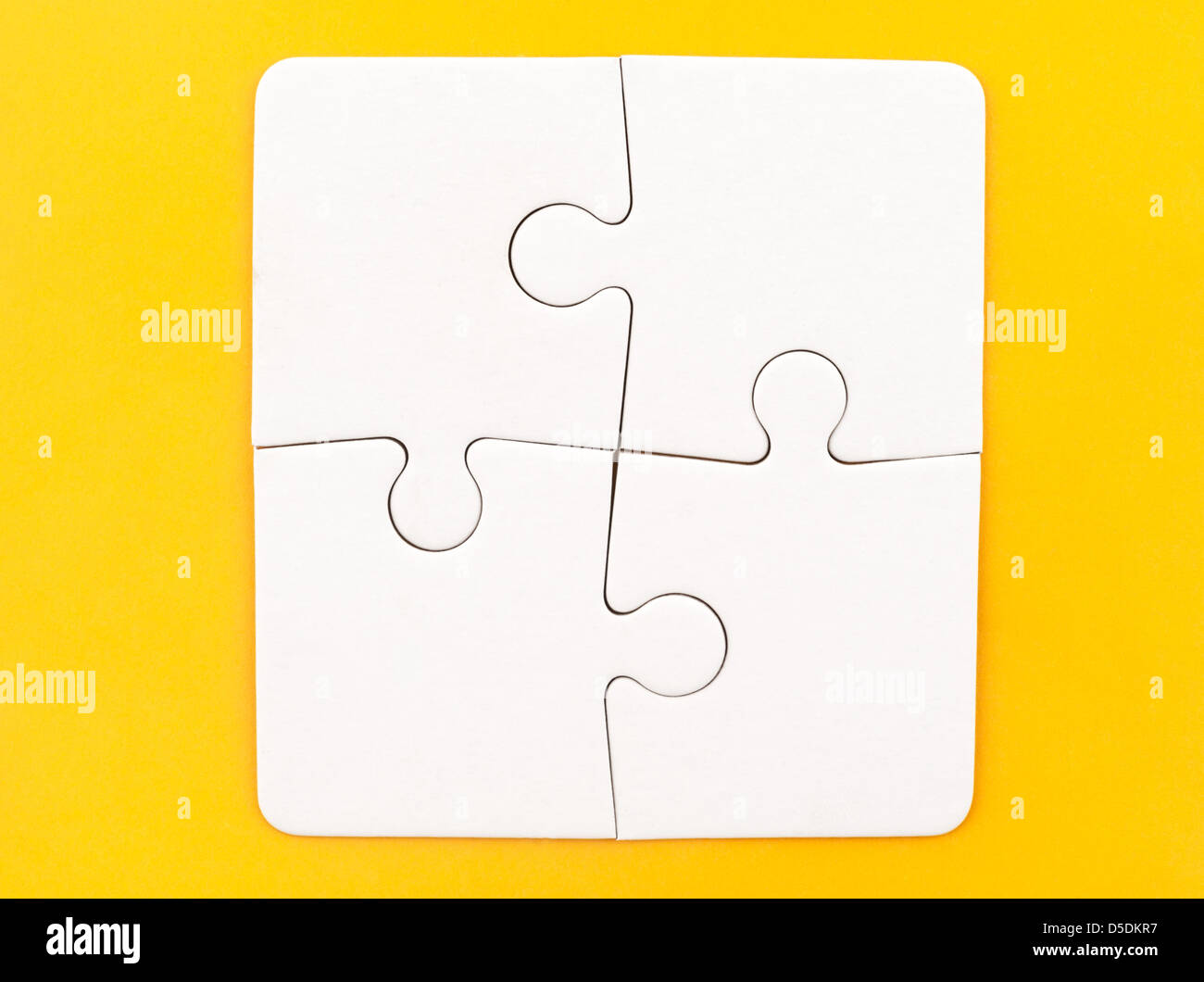 Group of white paper jigsaw puzzles Stock Photo - Alamy