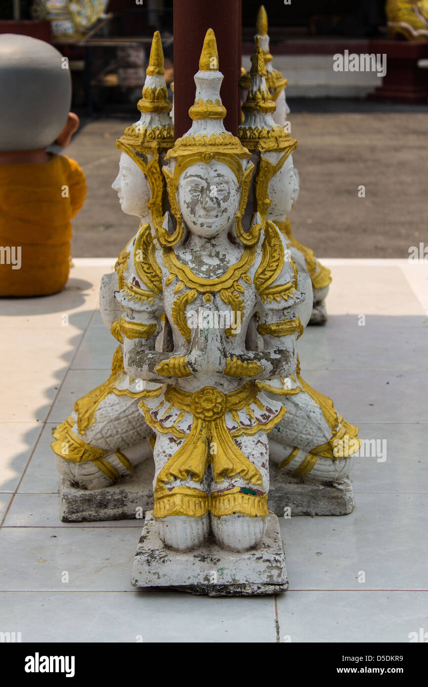 Sitting deva statue Stock Photo - Alamy
