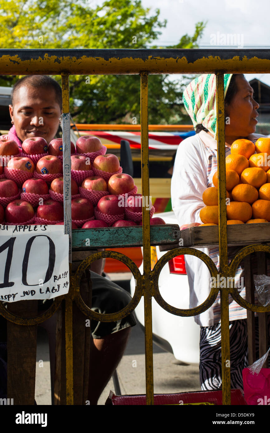 People selling fruit on the side of the road in Cebu City Stock Photo ...