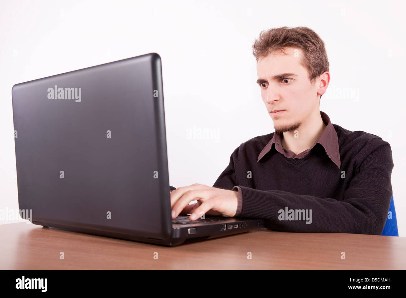 Man hide desk hi-res stock photography and images - Alamy