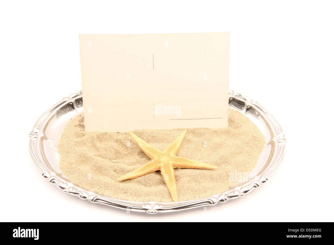 Serving plate of postcard and shell on the sand of the sea Stock Photo ...