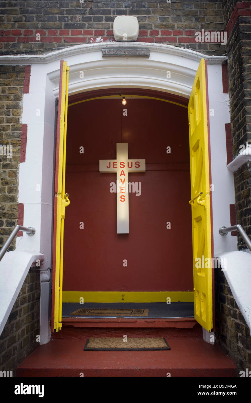 A Jesus Saves neon sign in the entrance of an evangelical church in ...