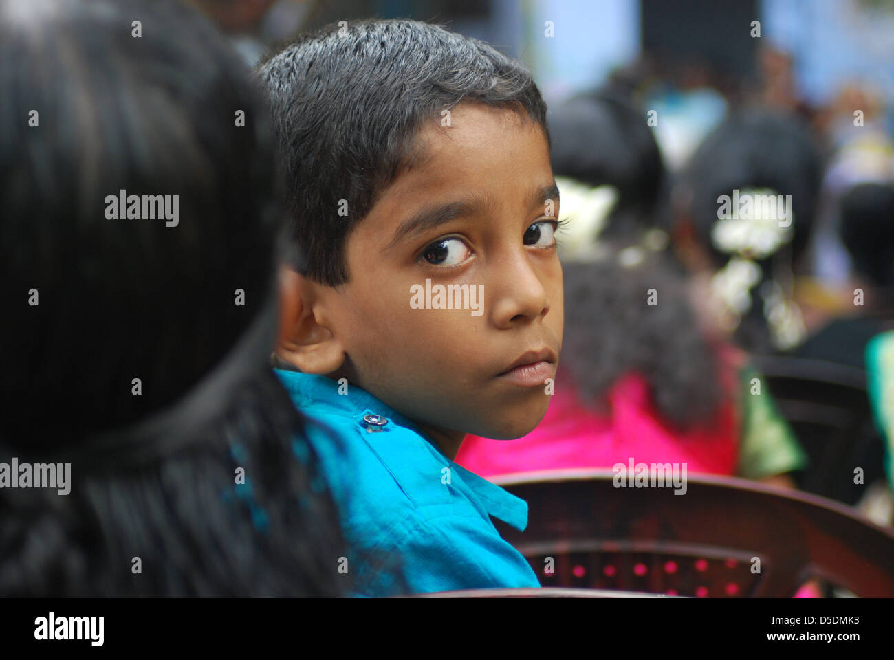 Kid looking back hi-res stock photography and images - Alamy