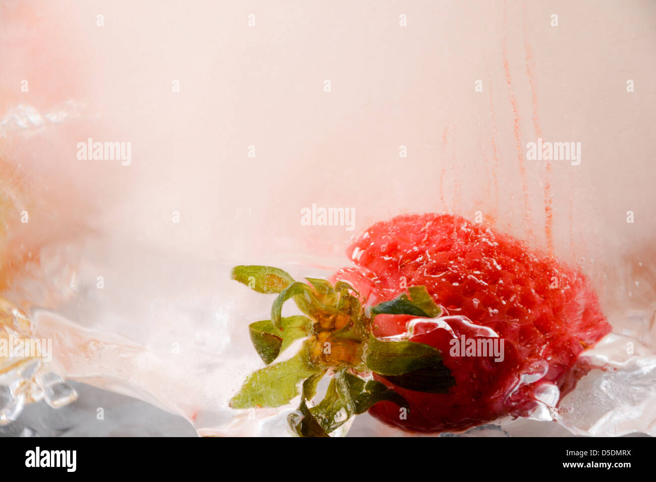 Strawberries with melting ice hi-res stock photography and images - Alamy