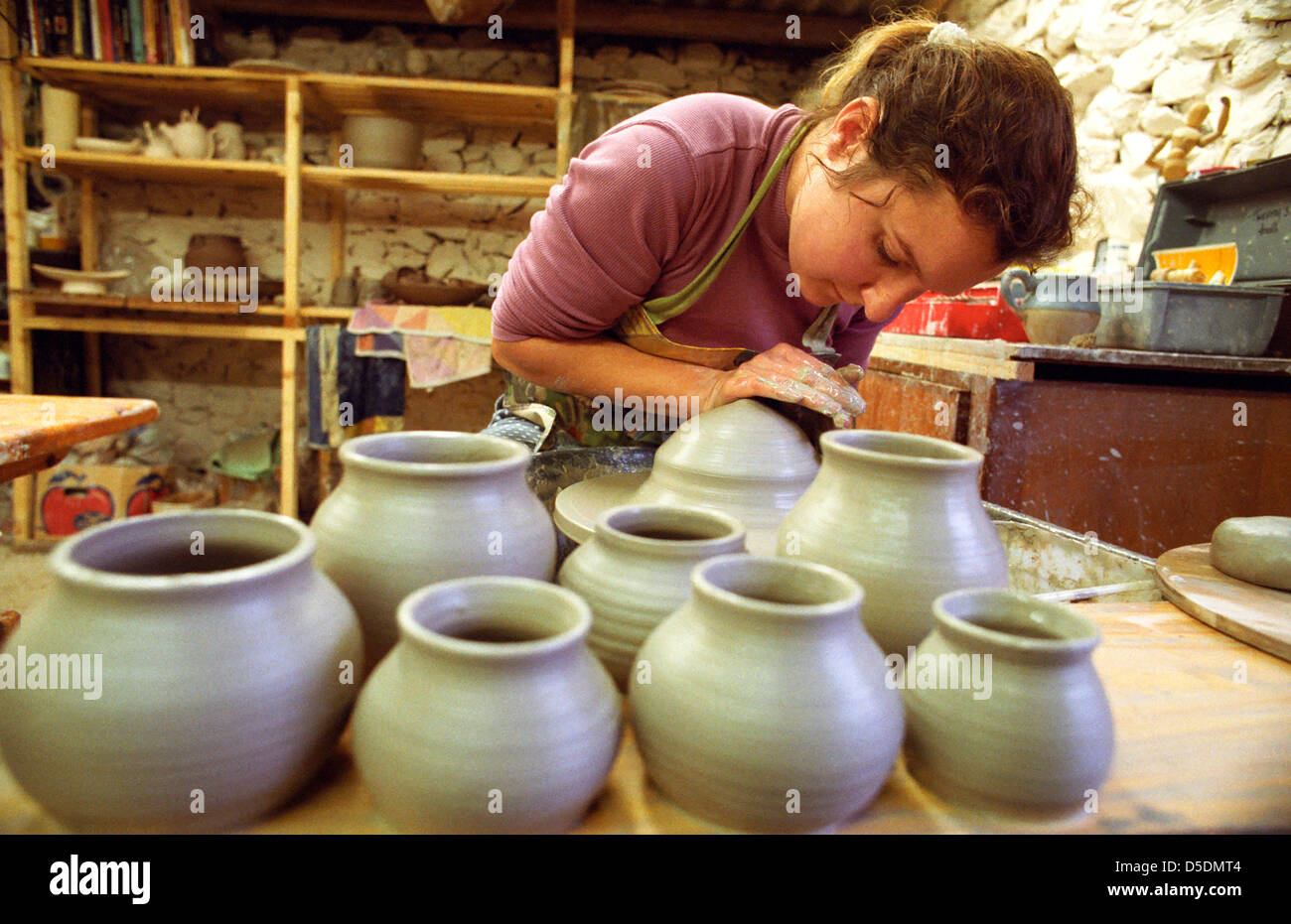 A potter at work in her studio Stock Photo - Alamy