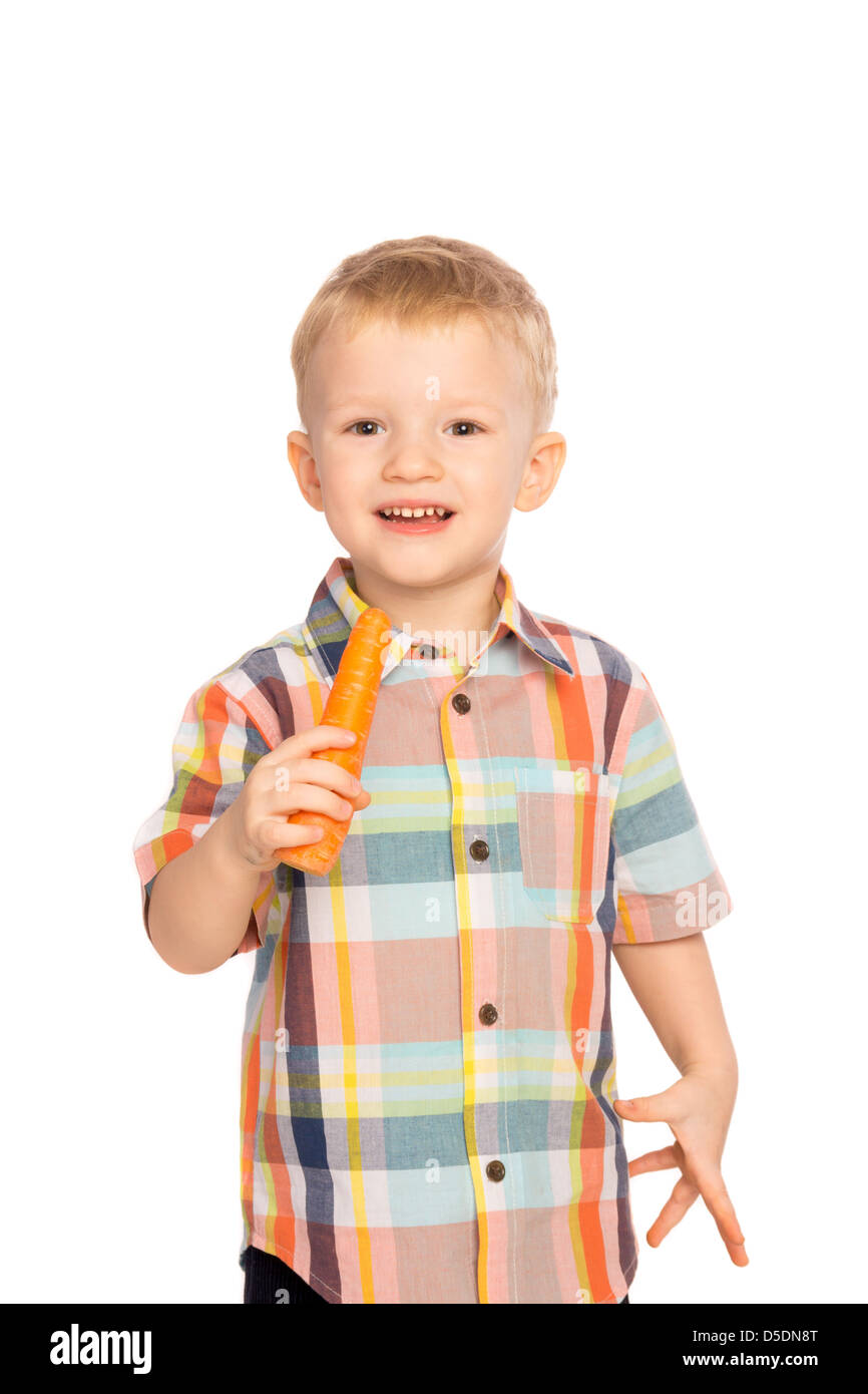 Beautiful happy smiling joyful child (little boy) eating healthy food ...