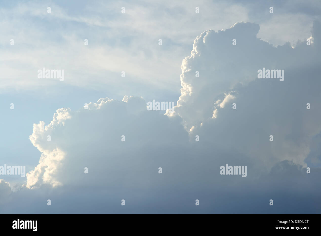 Divine sky. Sunlight illuminating clouds in the sky Stock Photo - Alamy