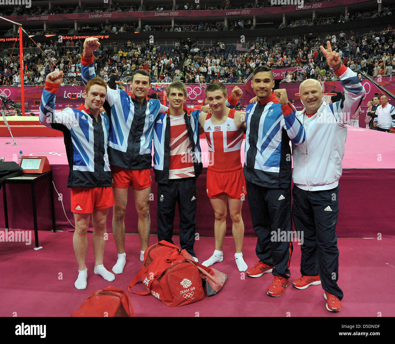 The GBR team celebrate at the end. Mens Team Artistic Gymnastics Stock ...