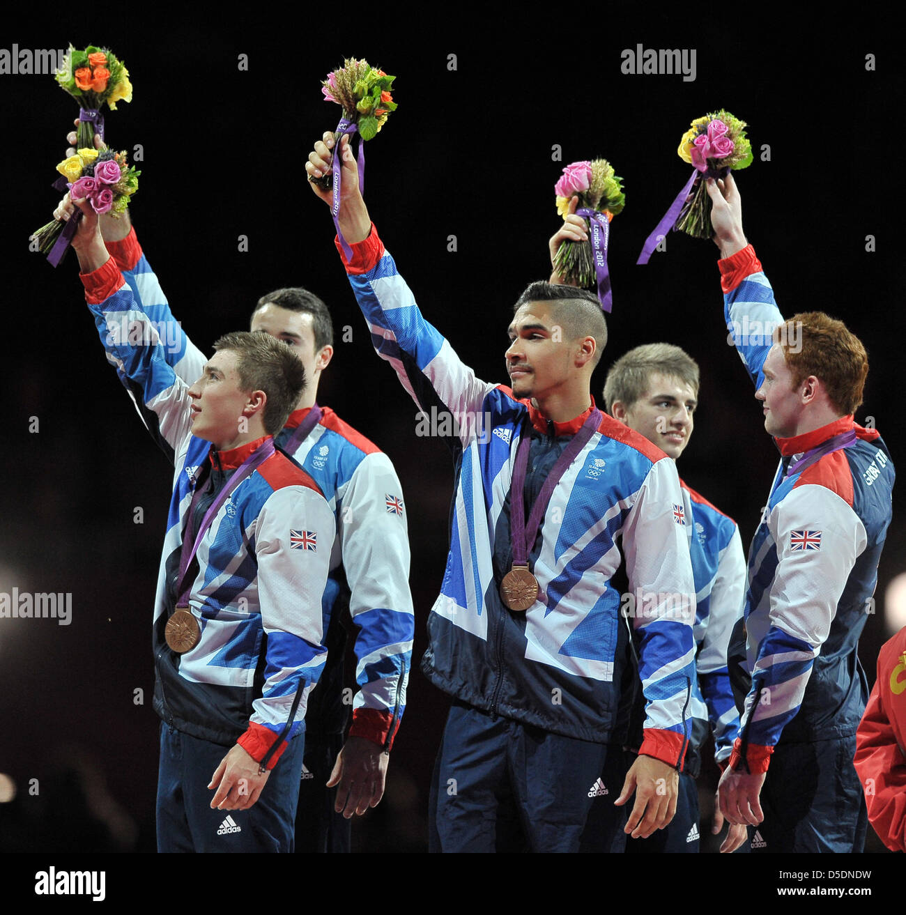 The GBR team with their medals and flowers. Mens Team Artistic ...