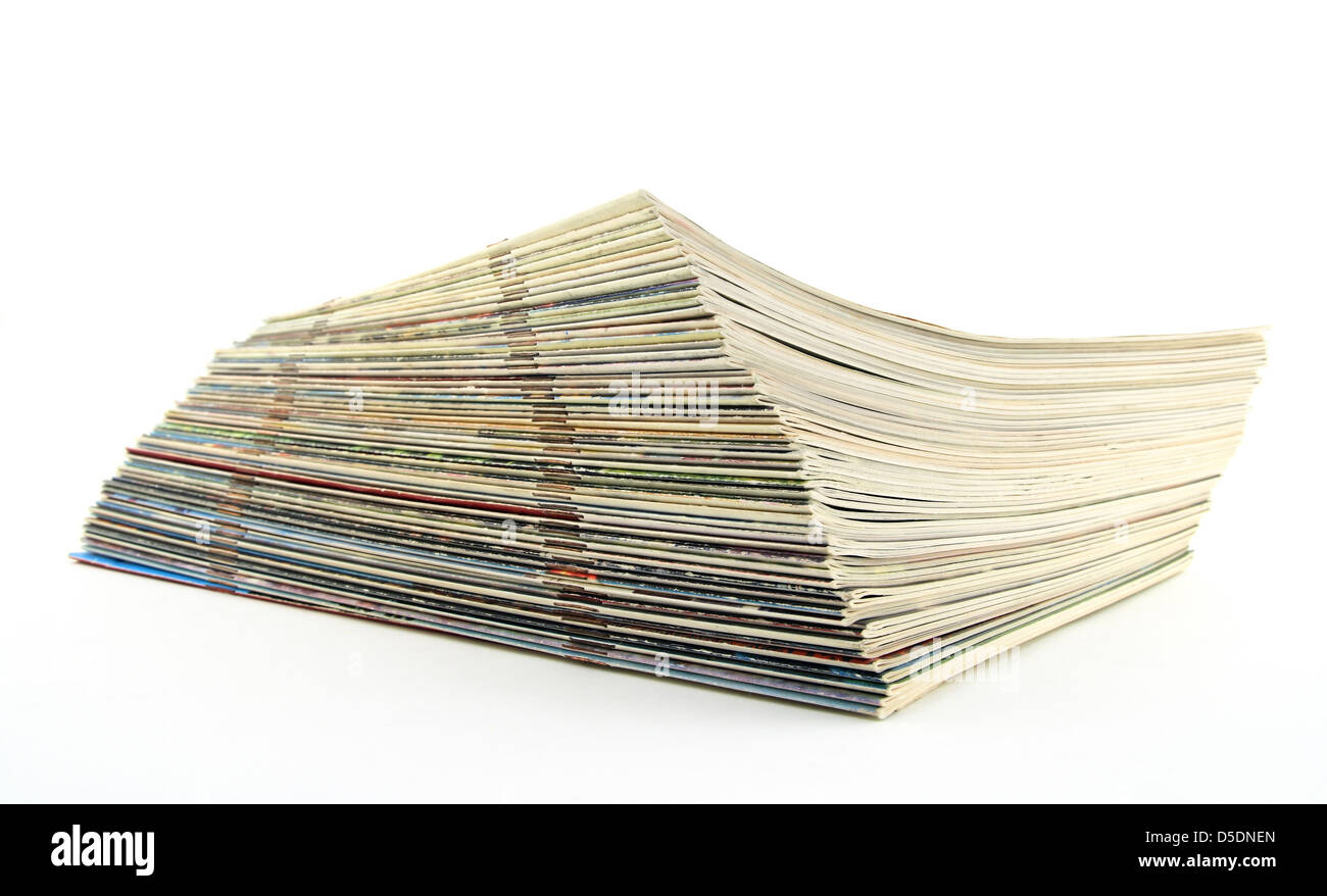 Stack of old magazines on white background Stock Photo - Alamy