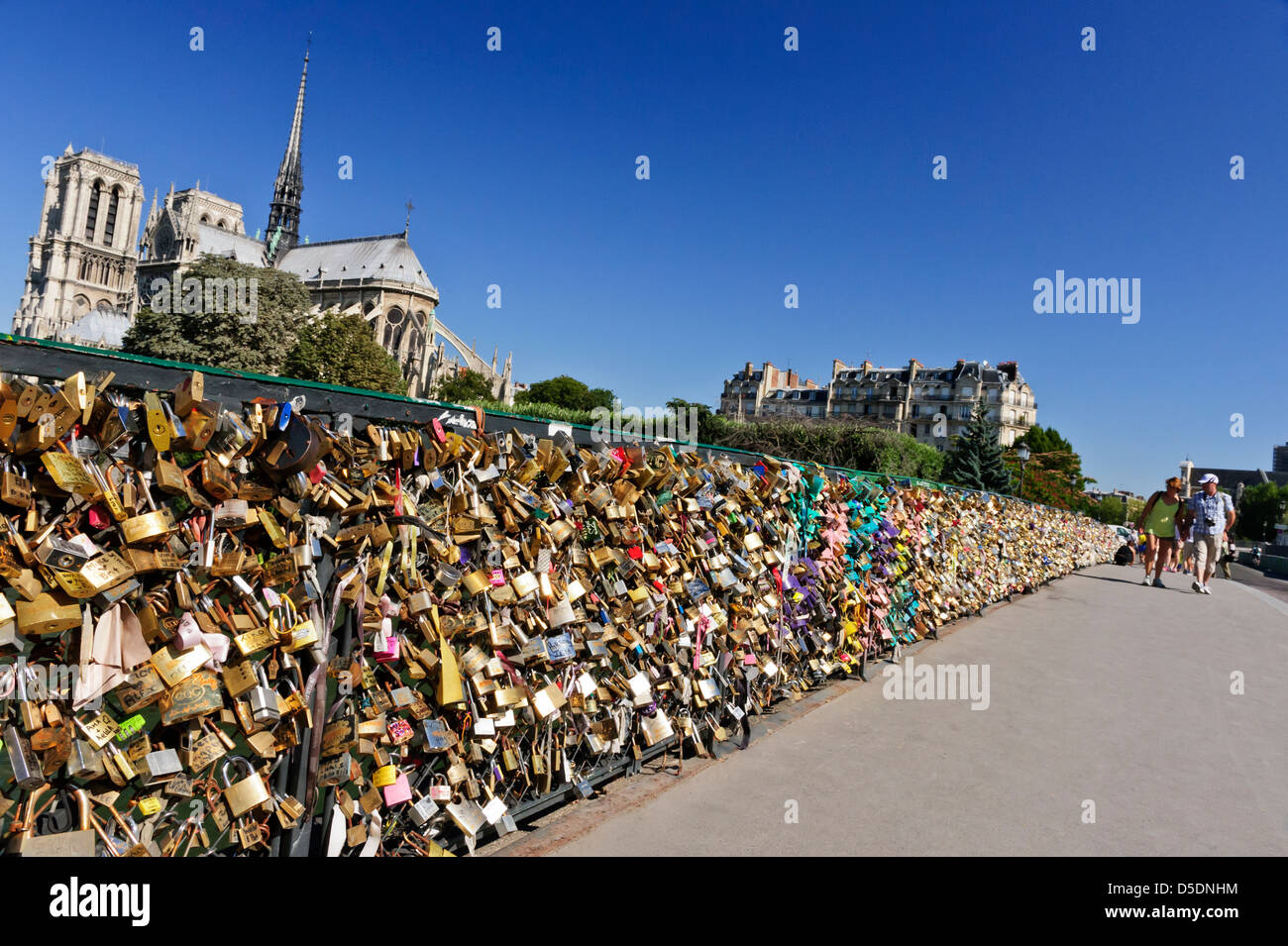 Thousands of Padlocks and locks securely fasten to the railings of Pont ...
