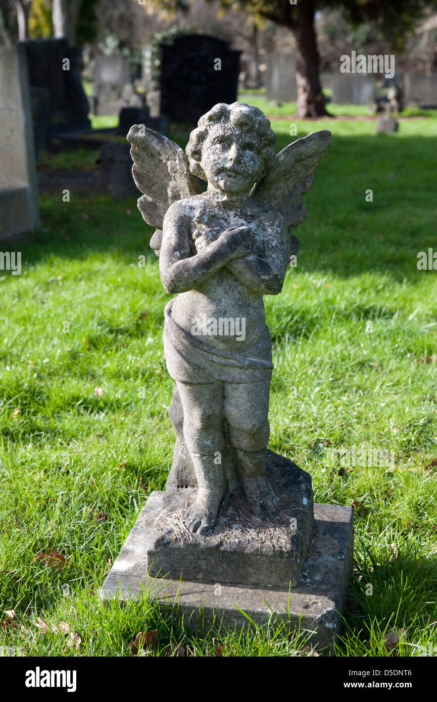 Alperton cemetery London, a cute angel with wings statue Stock Photo ...