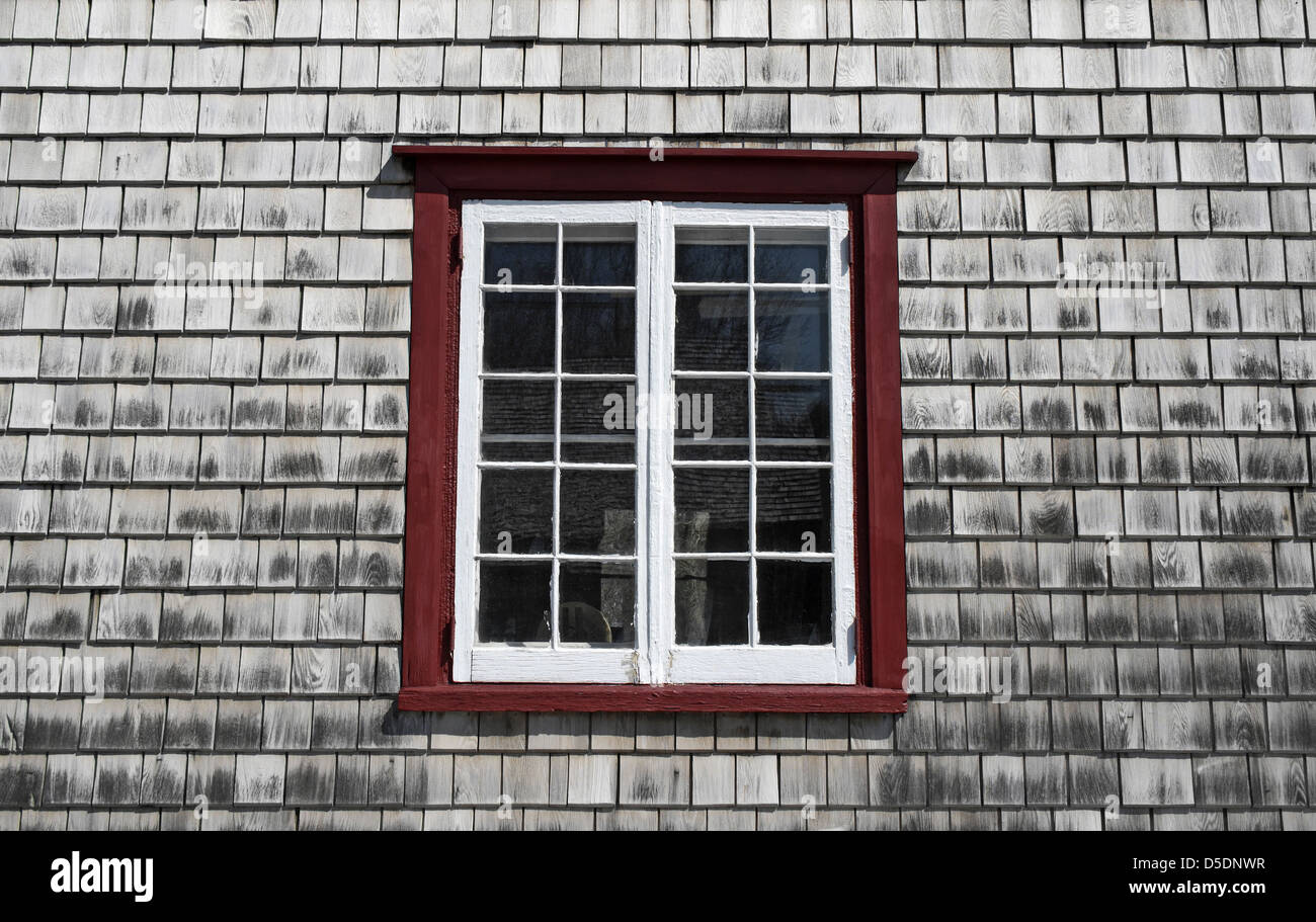 Window of an old country house with wooden tiled walls Stock Photo - Alamy