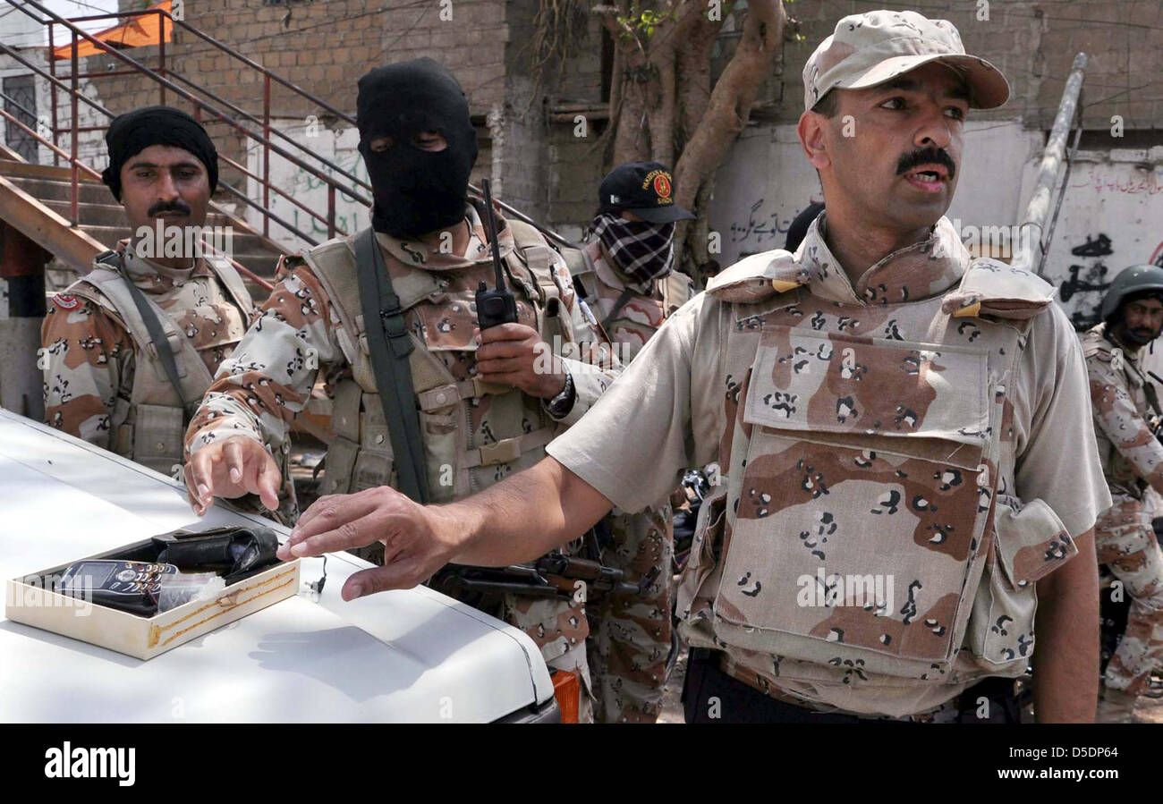 Rangers officials showing cell phone detonators that recovered from ...