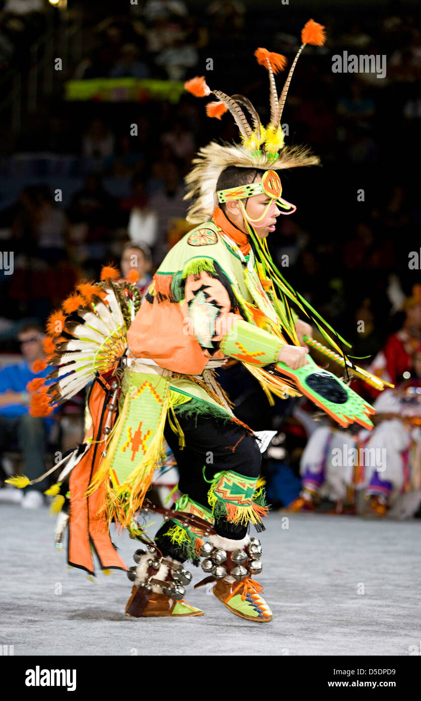 This image depicts Native American dancers at a 2007 Powwow, wearing ...