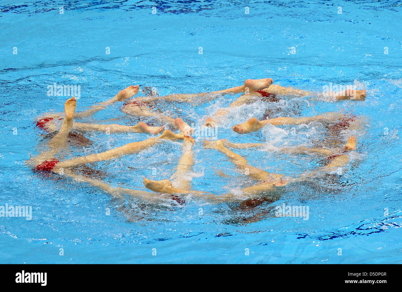 Rus centre womens synchronised swimming team 30th olympiad legs hi-res ...