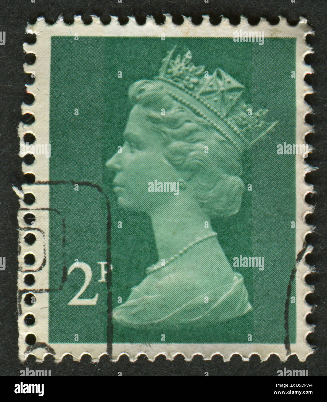 A stamp printed in UK shows image of Elizabeth II is the constitutional ...