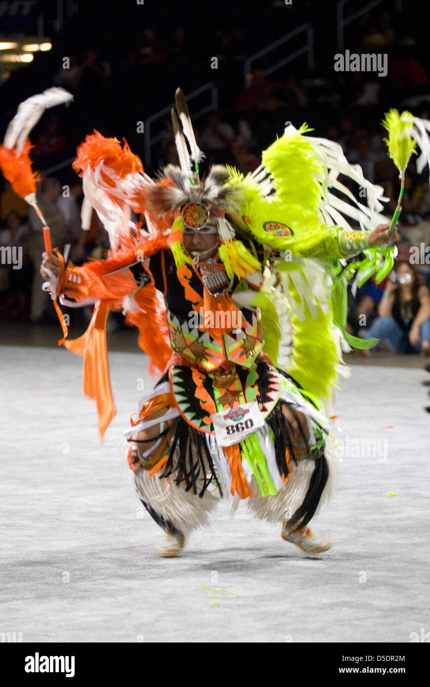 A ceremonial dance at a 2007 powwow, with participants in traditional ...