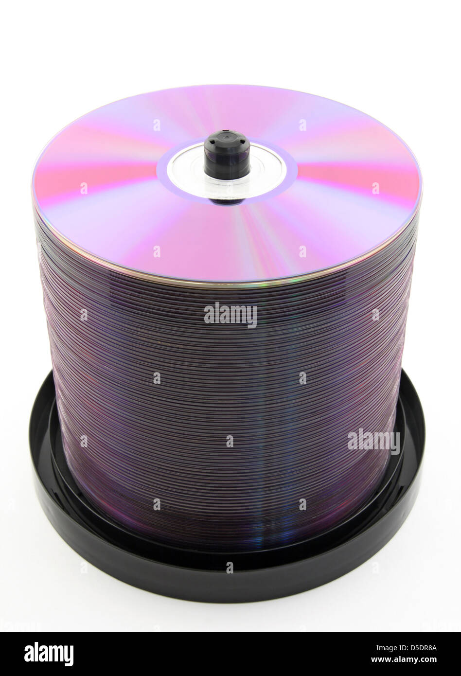 Colorful purple DVDs or CDs on spindle, on white background. No dust ...