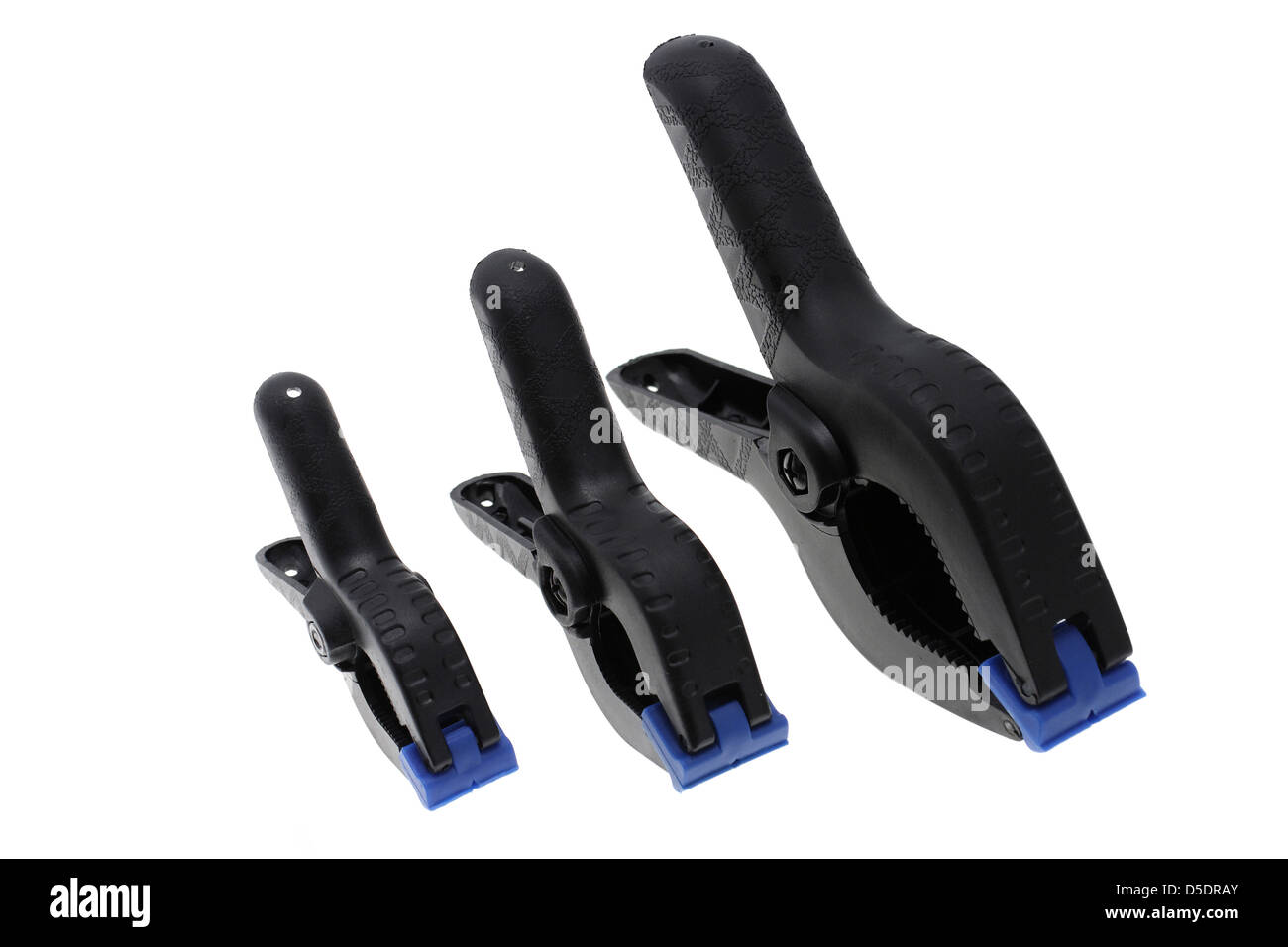 three plastic clamps composition. isolated on white background Stock ...