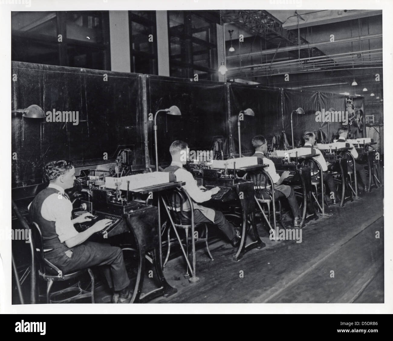 Row of Postal Clerks Processing Mail Stock Photo - Alamy