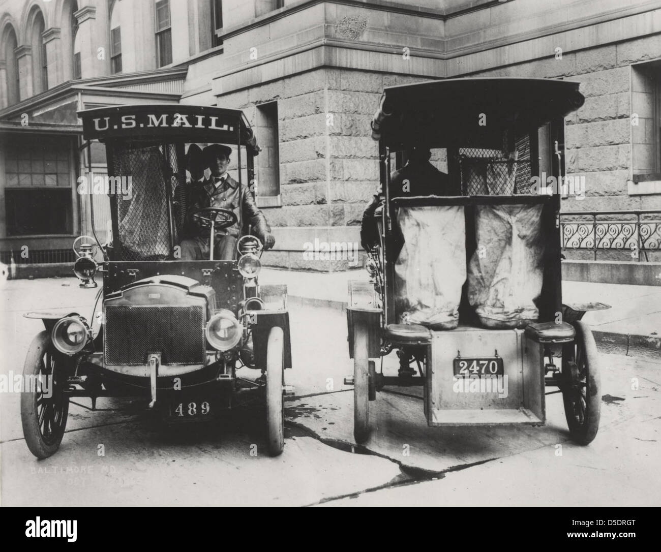 A photograph of a Columbia Mark 3 Touring Car used as a mail truck in ...