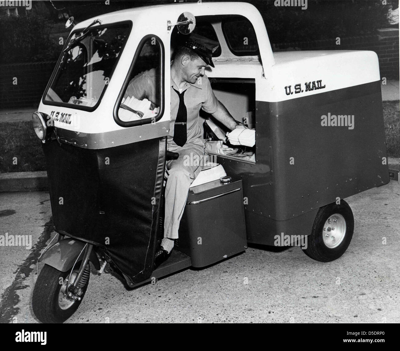 Letter Carrier in Mailster Vehicle Stock Photo - Alamy
