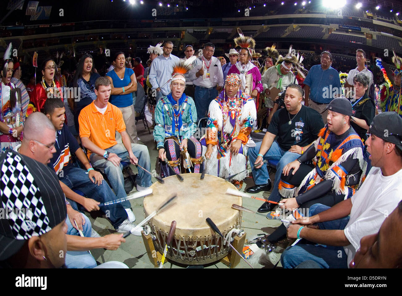 A photograph of Native American drummers performing at a powwow in 2007 ...