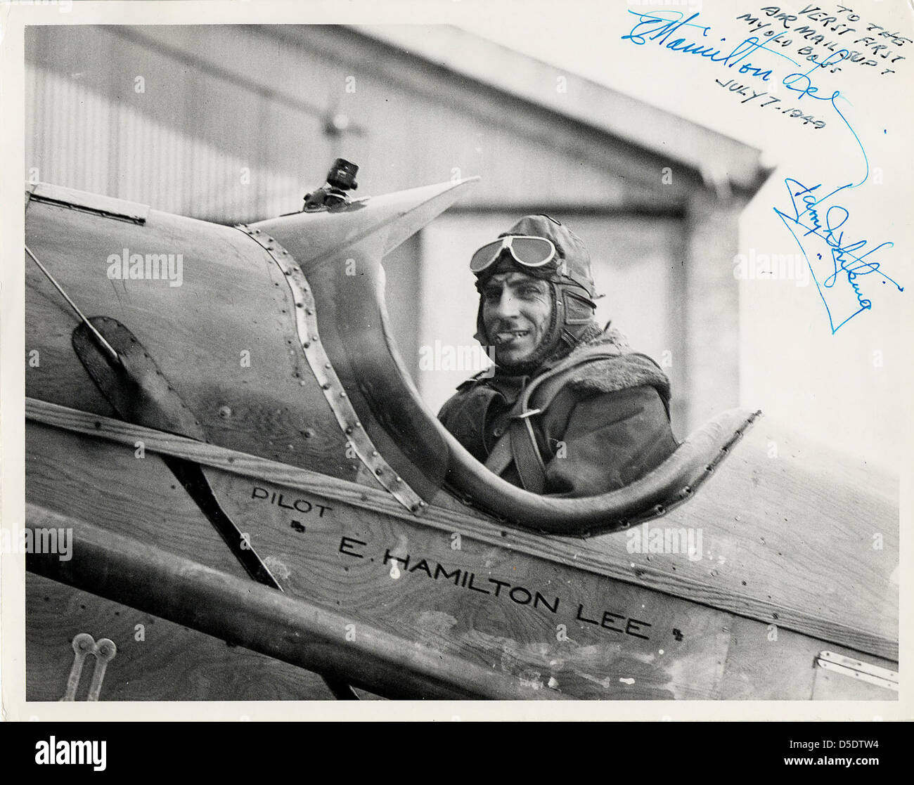 E. Hamilton Lee, an airmail pilot, is shown in his De Havilland DH.4B ...