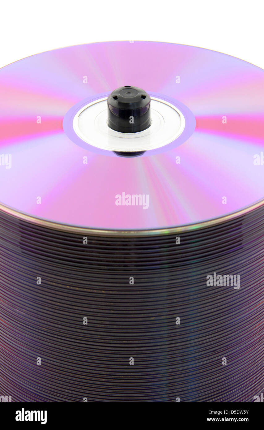 Purple CDs or DVDs on spindle, on white background. No dust Stock Photo ...