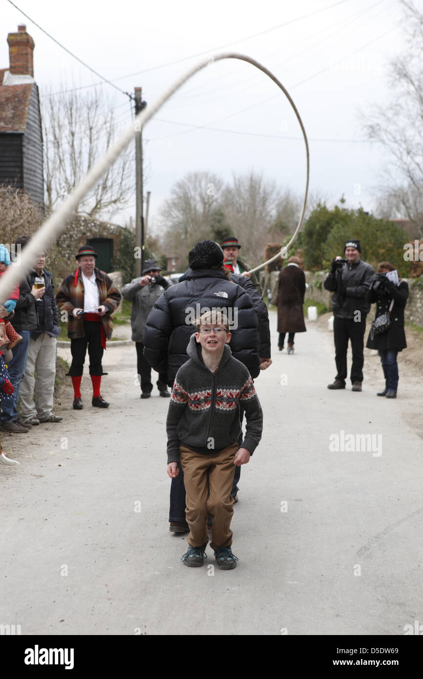 Locals of all ages take part in the custom of long rope skipping ...