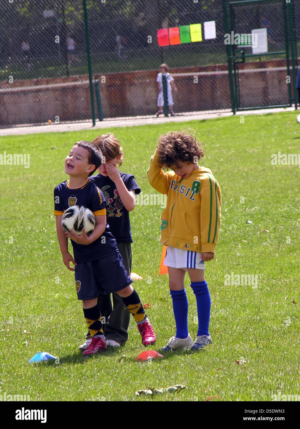Kids football activities in the park Stock Photo - Alamy