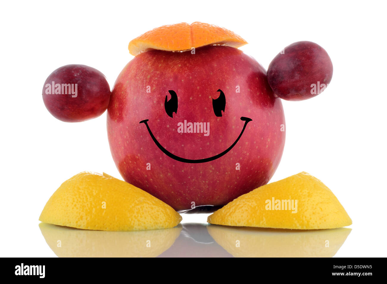 Happy diet. Funny fruit character Stock Photo - Alamy