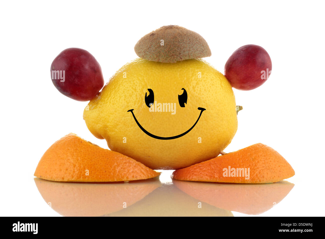 Happy diet. Funny fruit character Stock Photo - Alamy