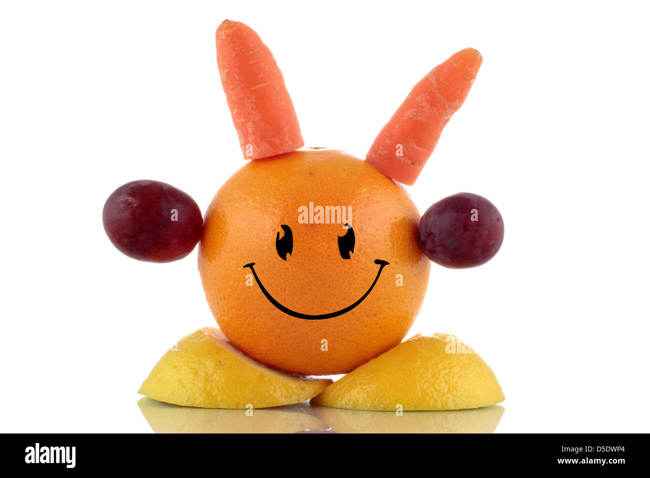 Happy diet. Funny fruit character Stock Photo - Alamy