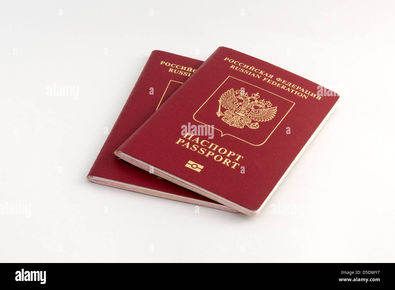 Two russian passports on white background Stock Photo - Alamy
