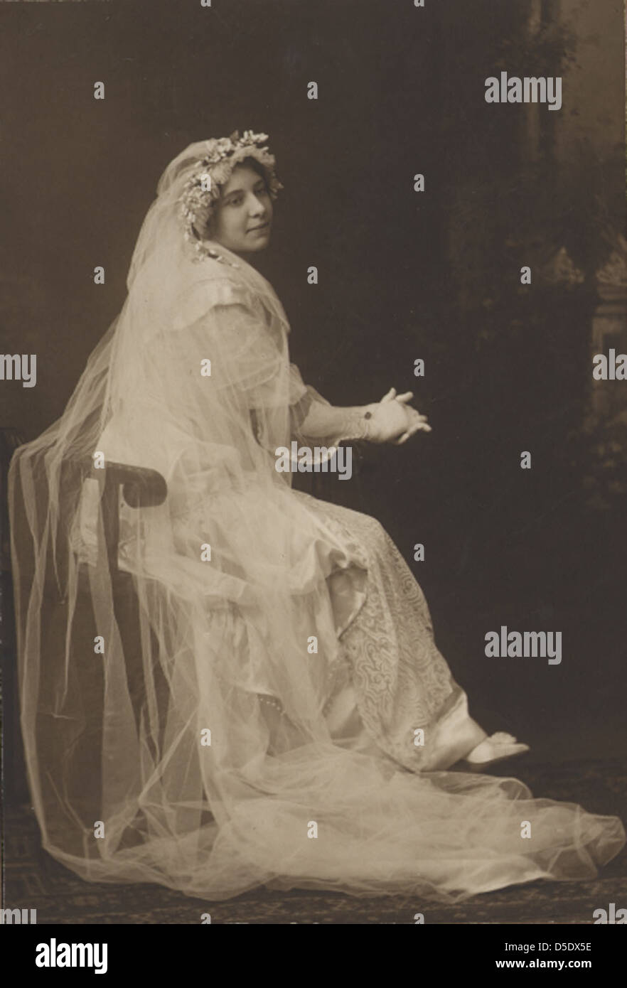 A vintage black-and-white portrait of a bride, possibly from the late ...