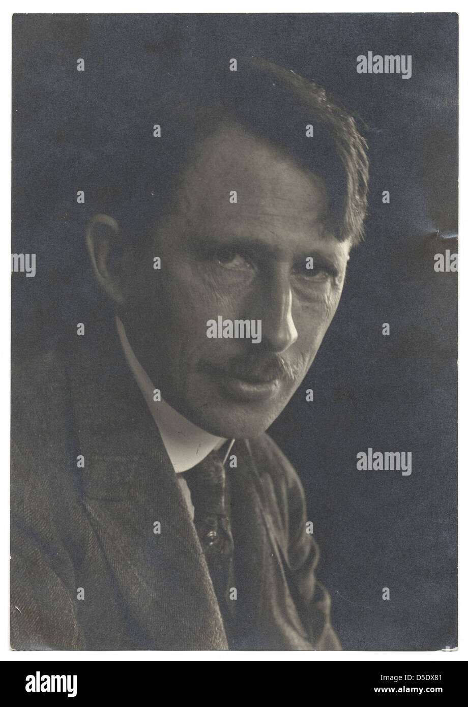 This sepia-toned image features Wladyslaw T. Benda, an artist known for ...