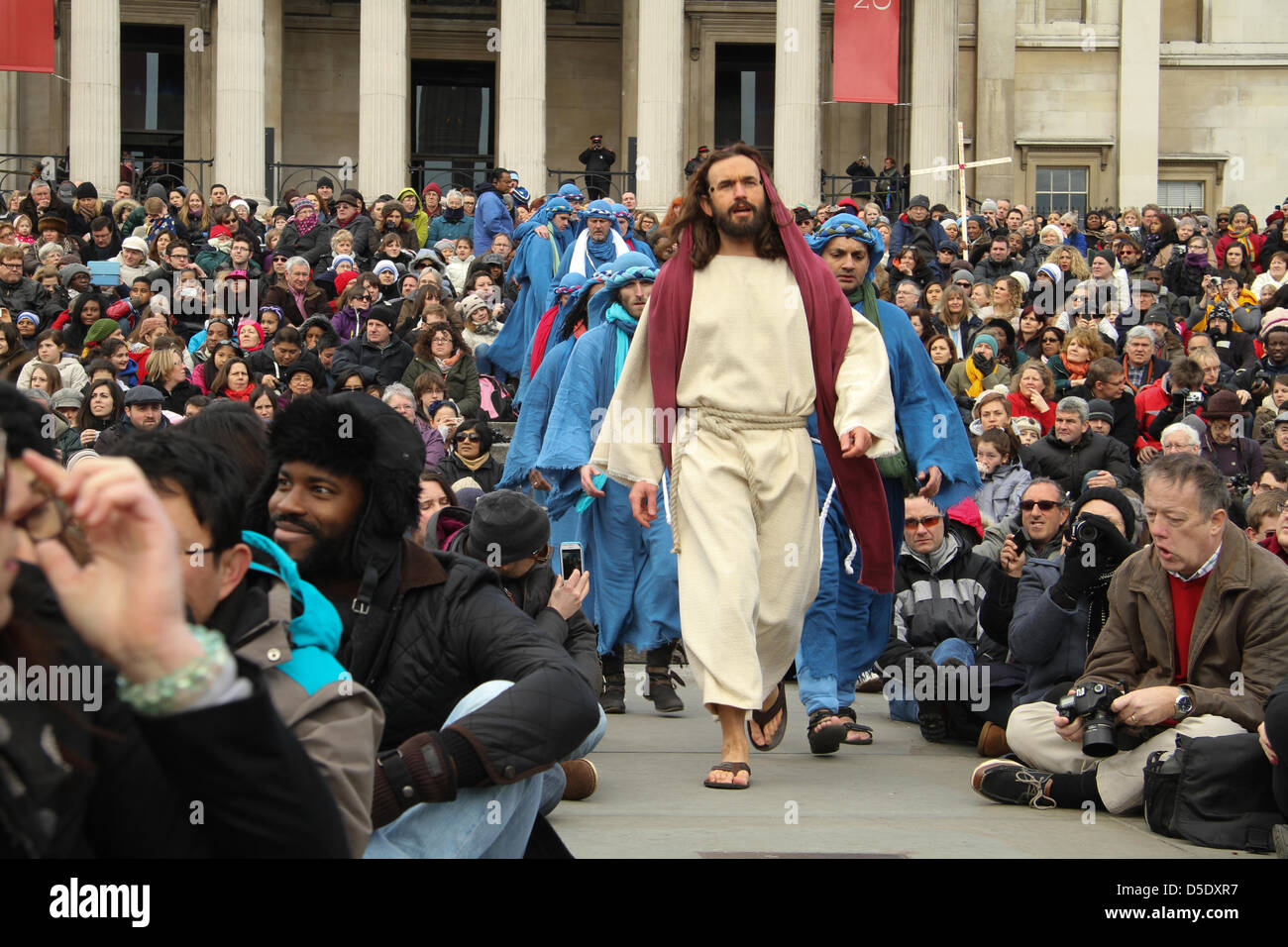 Jesus is followed by his disciples into Trafalgar Square during the 3rd ...