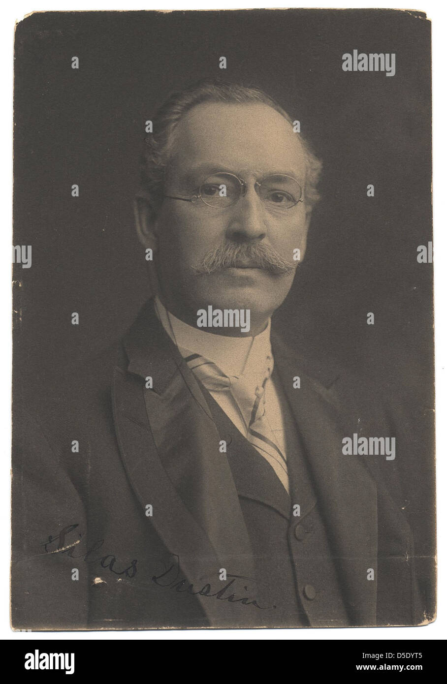 A black-and-white photograph of American artist Silas S. Dustin, known ...