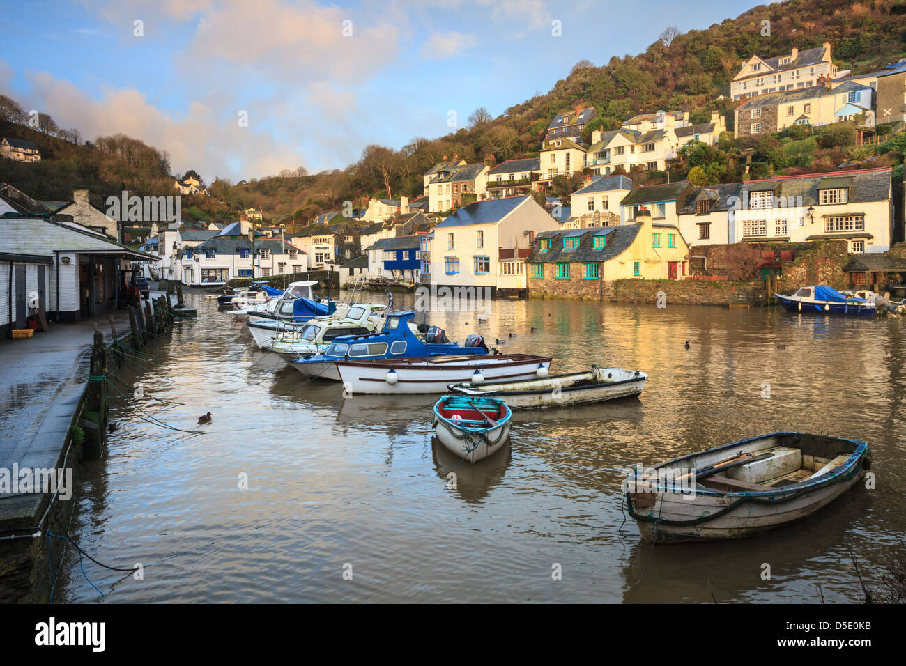 Polperro Harbour in Cornwall captured shortly after sunrise Stock Photo ...