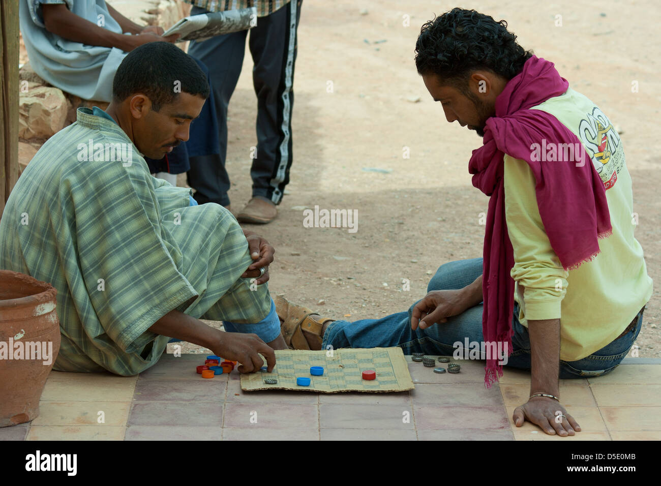 Two men playing checkers Stock Photo - Alamy